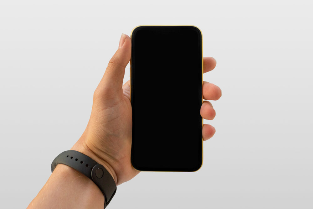 iPhone in Hand PSD Mockup — Mr.Mockup