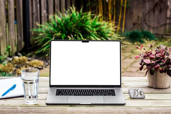 Free MacBook Pro on Wood Desk Mockup — Mr.Mockup