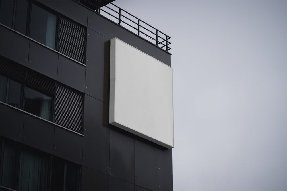 Free Sign on Building Mockup — Mr.Mockup