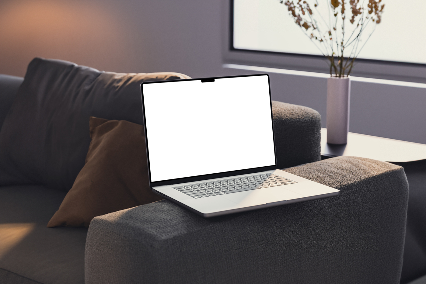 Free MacBook Pro on Couch Mockup — Mr.Mockup