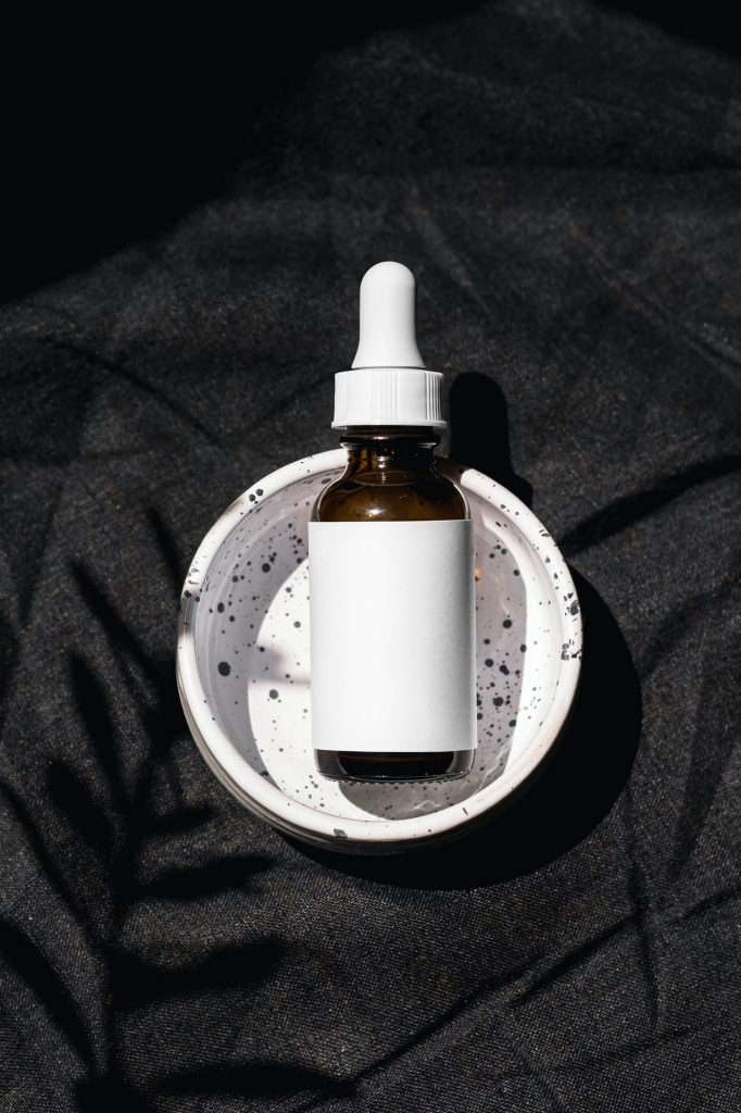 Free Cosmetic Bottle with Label Mockup — Mr.Mockup