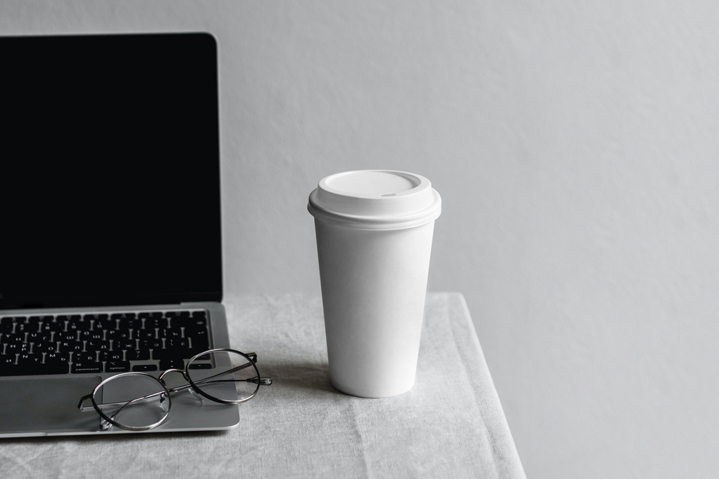 Free Paper Coffee Cup with MacBook Mockup — Mr.Mockup