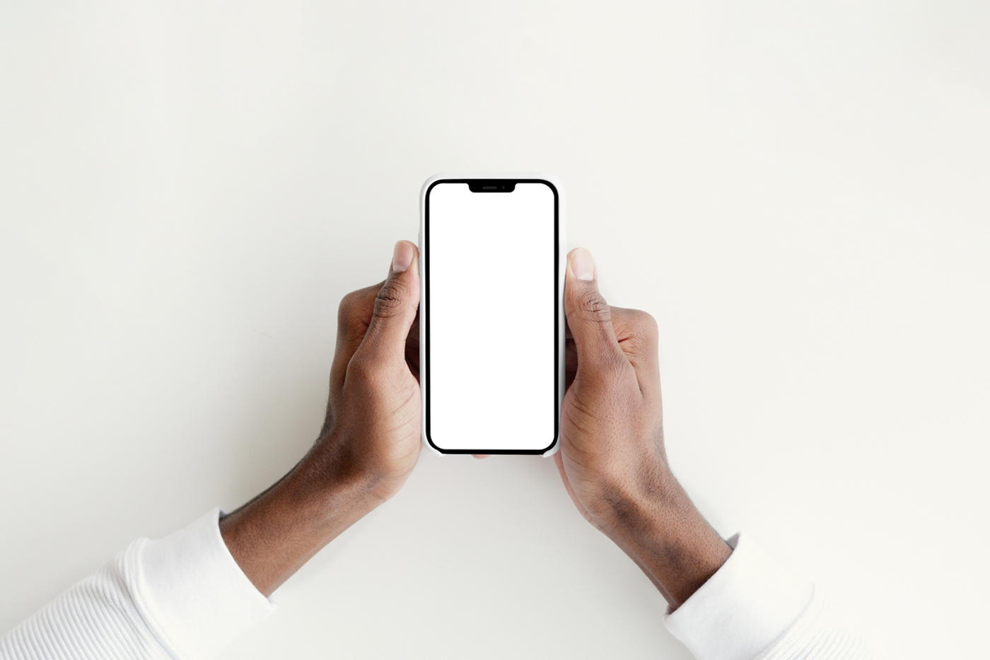 Free iPhone Pro in Hands Mockup — Mr.Mockup