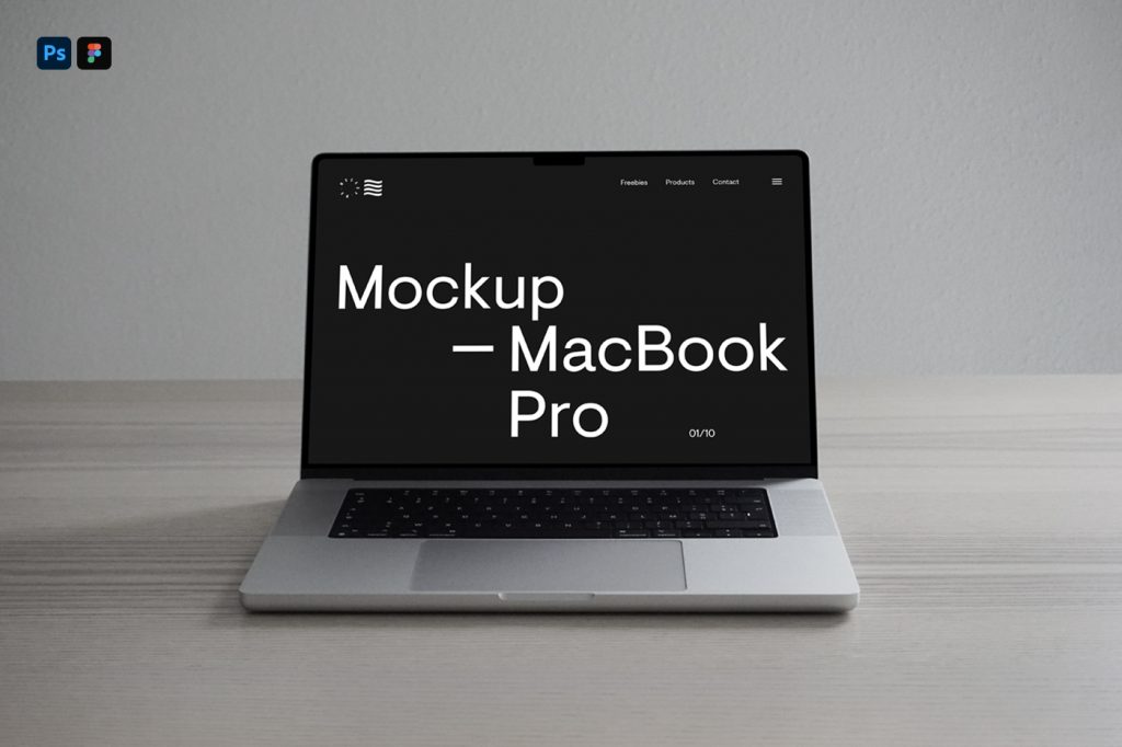 Free Silver MacBook Pro on Desk Mockup — Mr.Mockup