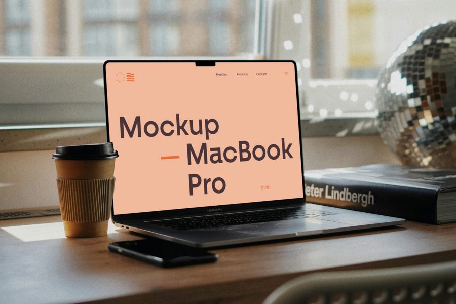 Free MacBook Pro on Writing Desk Mockup — Mr.Mockup