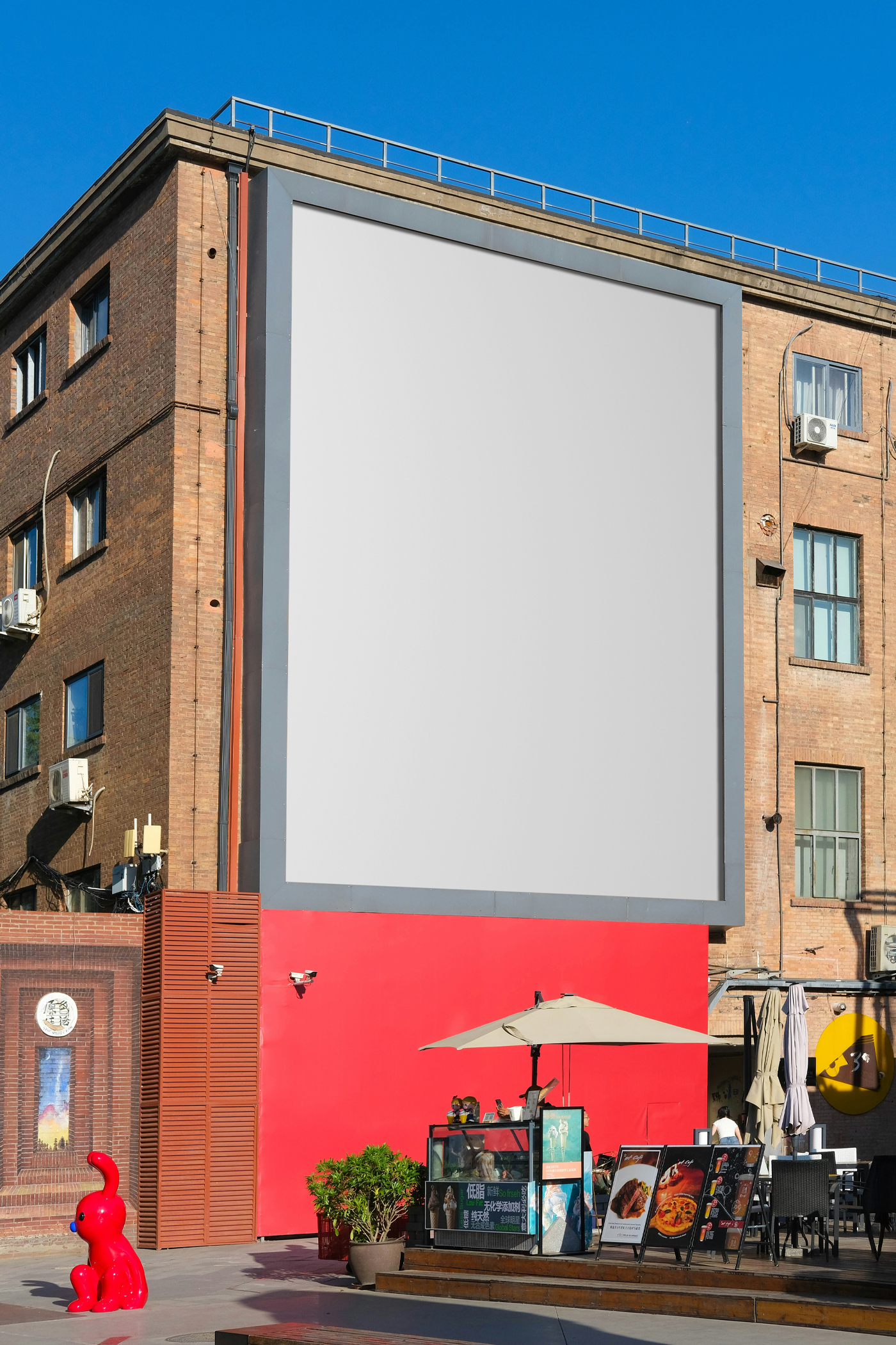 Free Billboard on Brick Building Mockup — Mr.Mockup