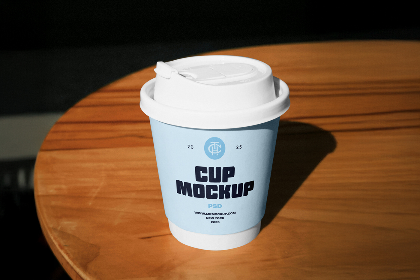 Free Coffe Cup on a Table PSD Mockup — Mr.Mockup