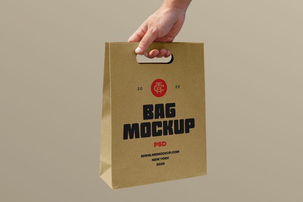 Free Holding Craft Paper Bag Mockup — Mr.Mockup